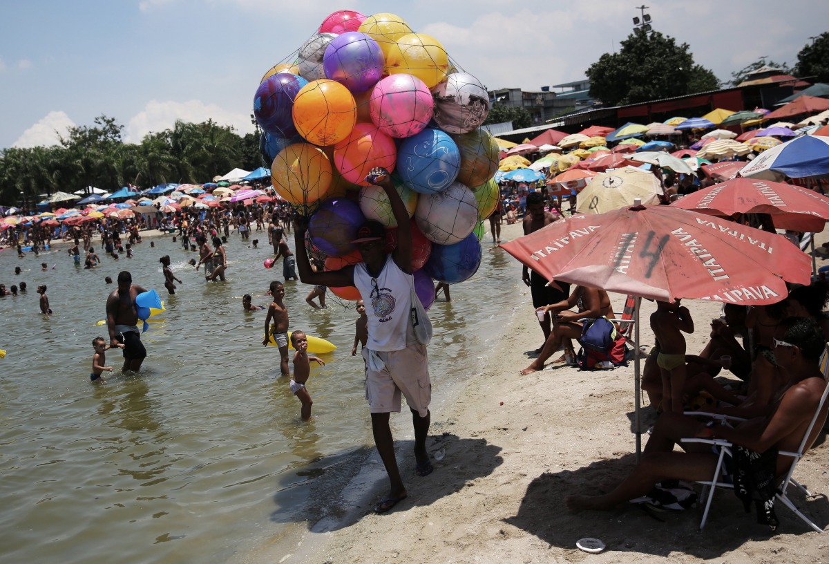 Blue-collar bathers revel at alternative to Rio beach scene | The ...