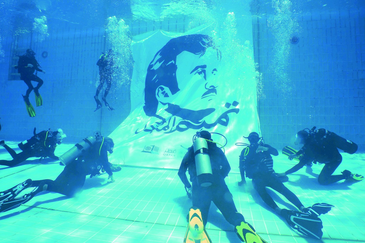 Qatar University Aquatic Center launches underwater version of Tamim Al ...