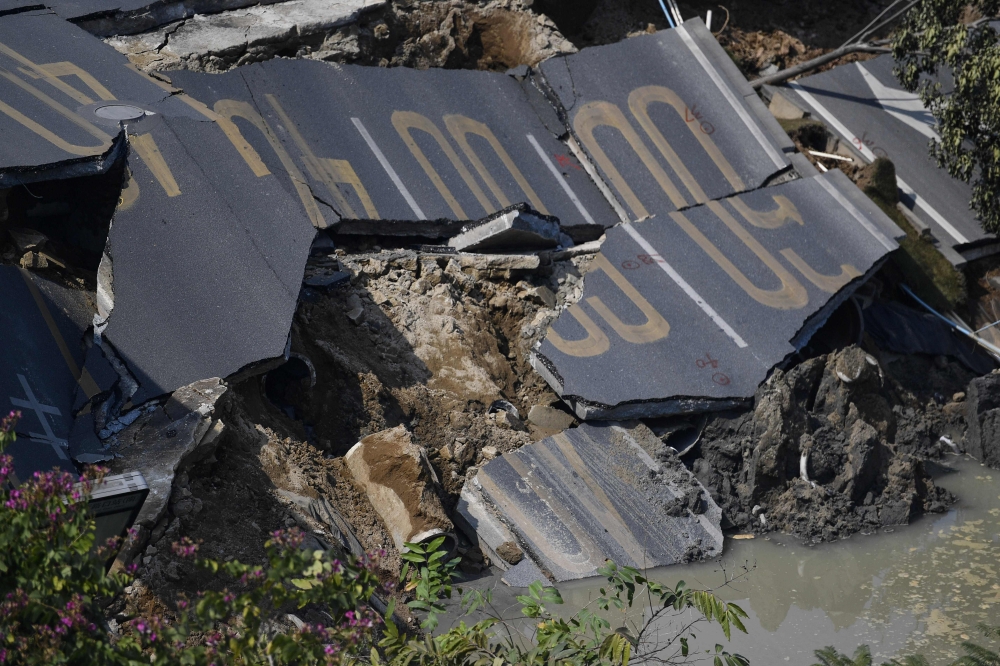 Eight dead, three missing after China road collapse | The Peninsula Qatar