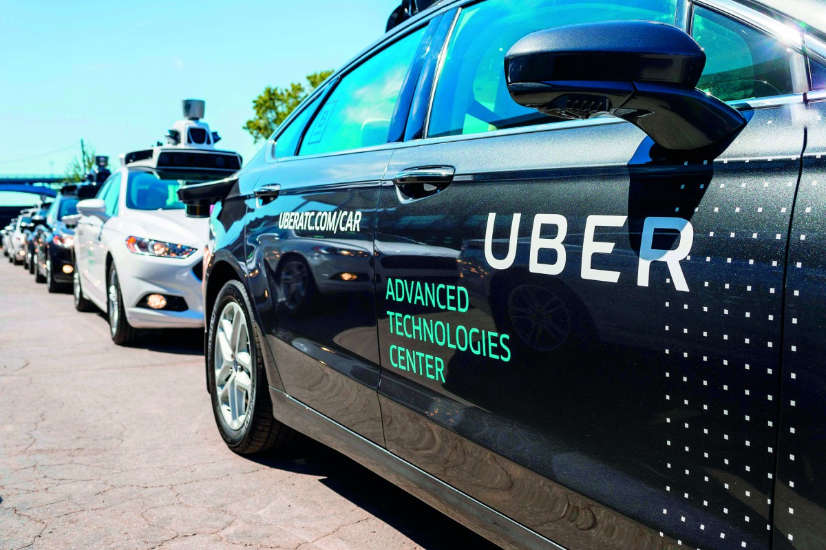 Toyota invests $500 million in Uber to get self-driving cars on the ...