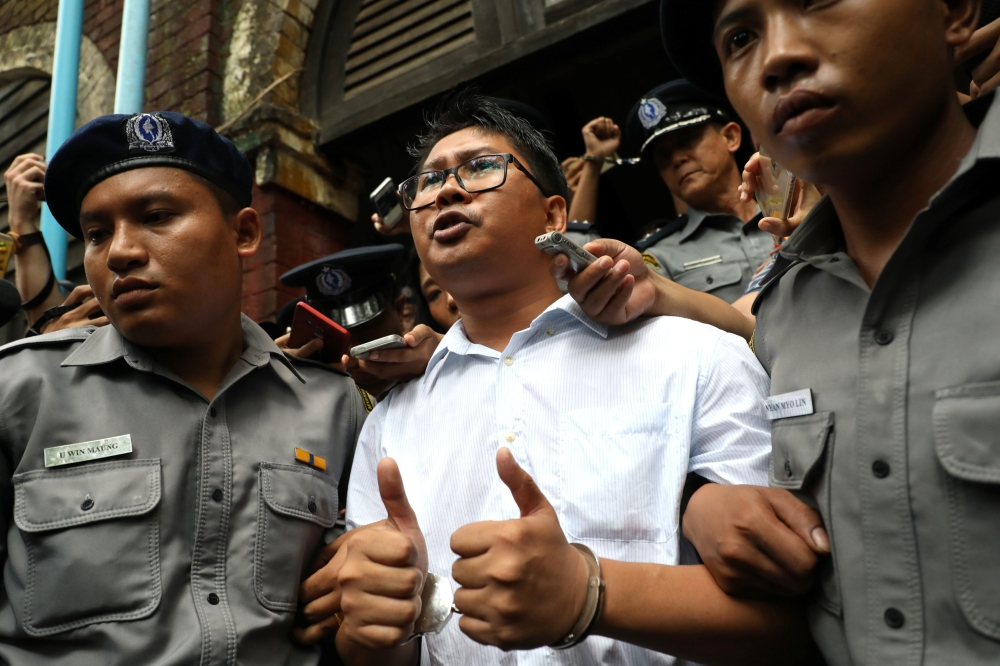 Reuters Myanmar reporters jailed for seven years in landmark secrets ...