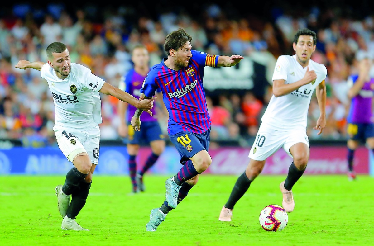 Messi scores in draw at Valencia, Barca winless in 4 rounds | The ...