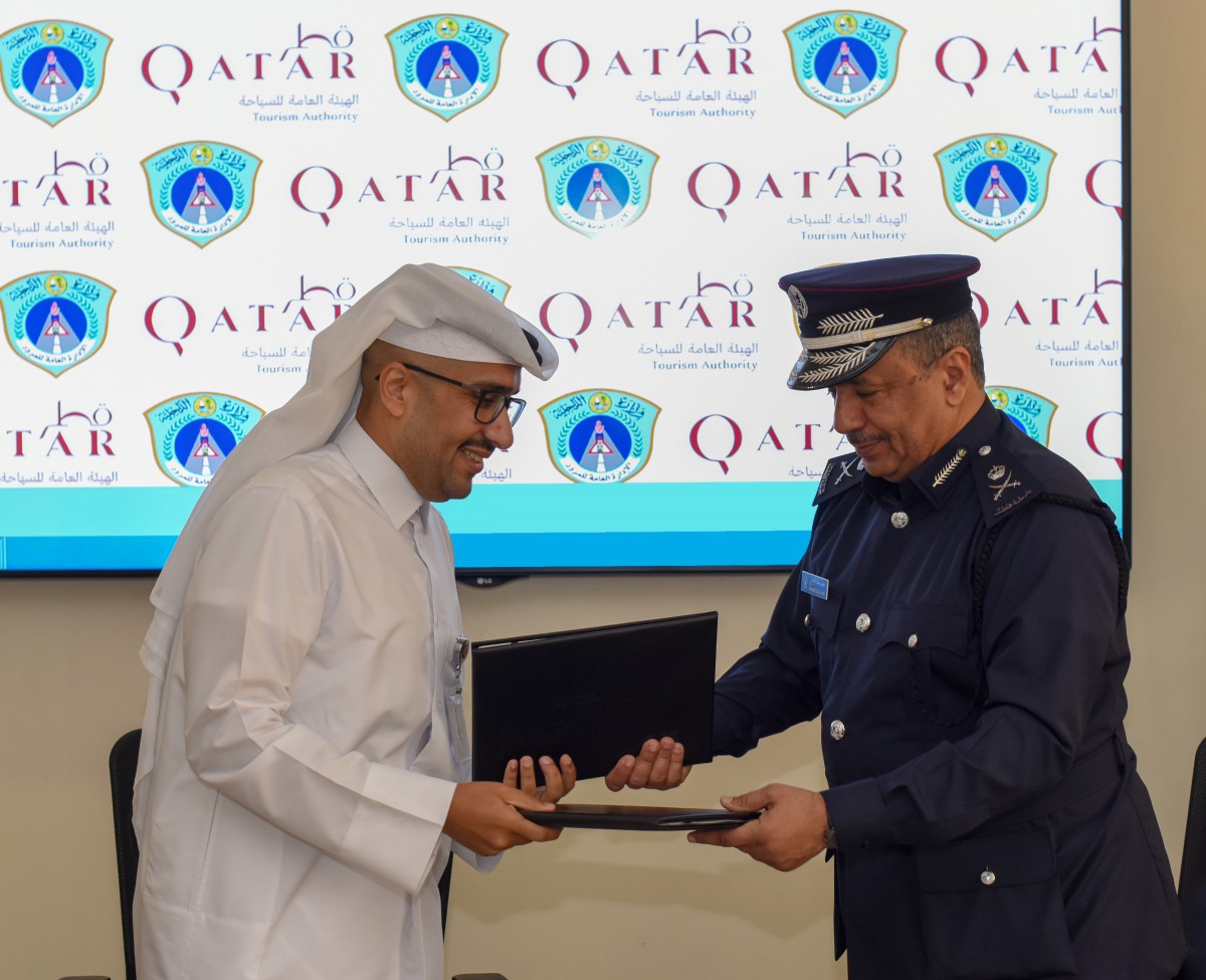 QTA, Traffic dept sign MoU to regulate tourist vehicles | The Peninsula ...