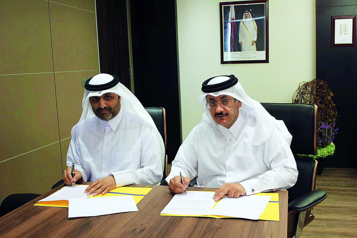 HMC, Qatar Post sign pact to provide premium services for patients ...