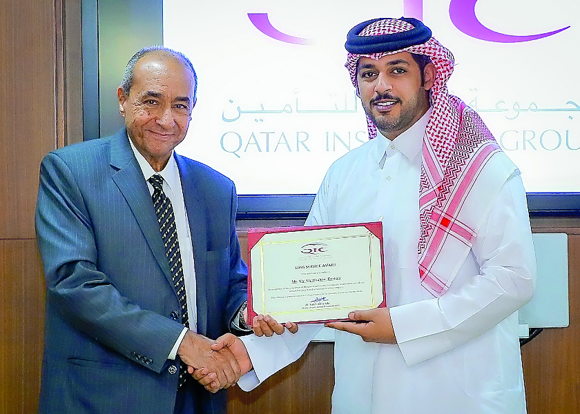 QIC Group honours long-serving employees with awards | The Peninsula Qatar