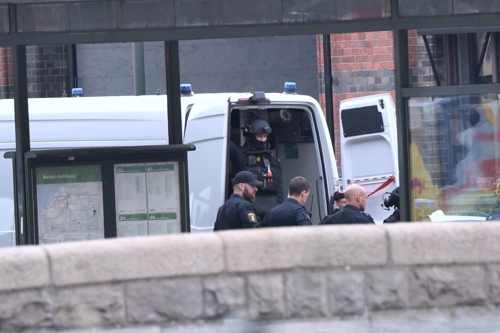 Swedish police shoot man at Malmo central station after bomb threat ...