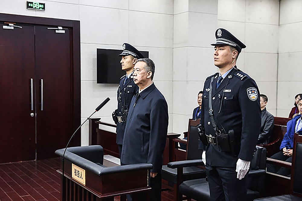 China's former Interpol chief sentenced to 13 years in prison | The ...