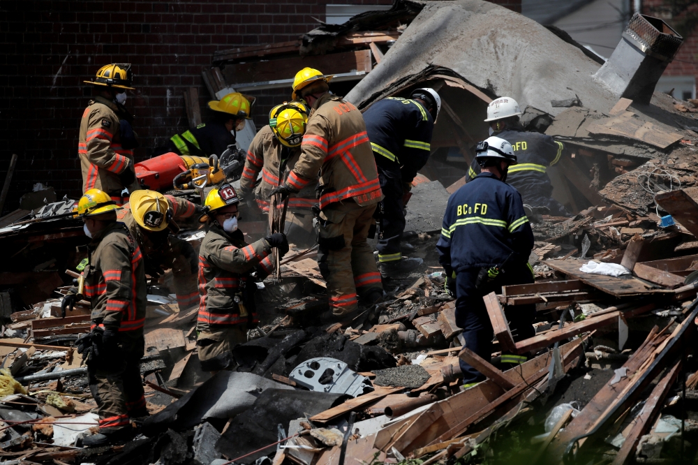 Gas explosion destroys Baltimore homes; 1 dead as firefighters search ...