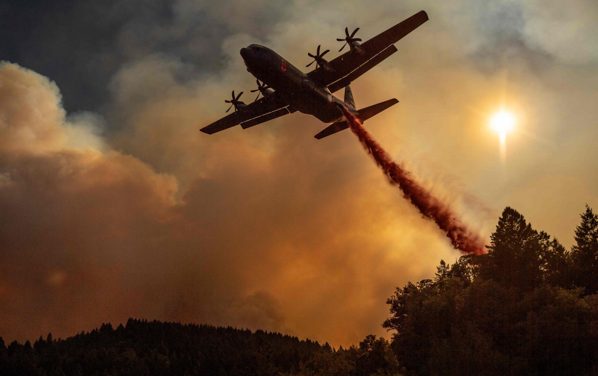 Firefighters tackle California fires covering 1 million acres | The ...