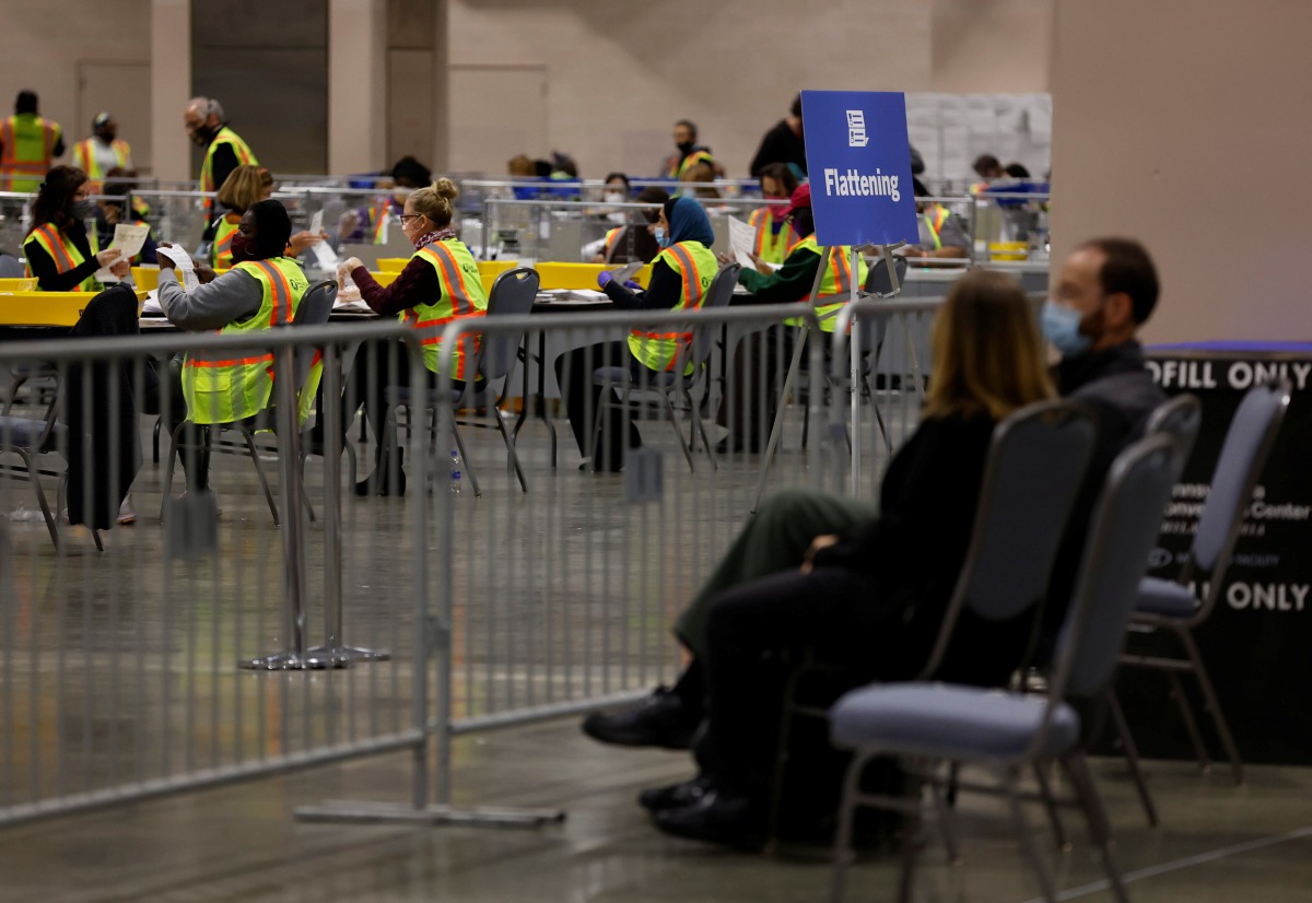 Michigan still counting votes, angry poll watchers barred in Detroit ...