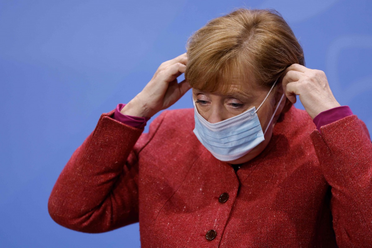 Germany's Merkel pushes stricter COVID measures, states want to wait ...