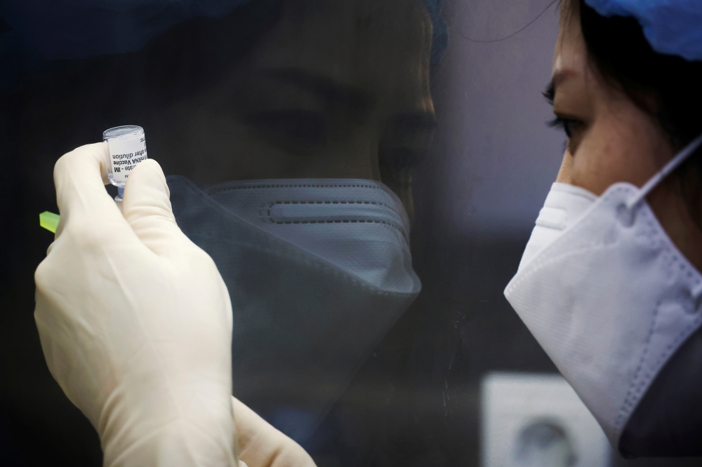 S.Korean hospitals extract extra COVID vaccine doses from vials | The ...
