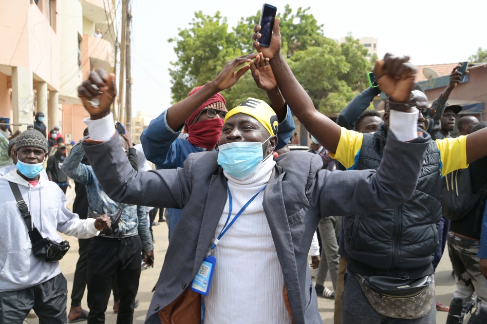 Senegal police smash car, forcibly remove opposition leader | The ...