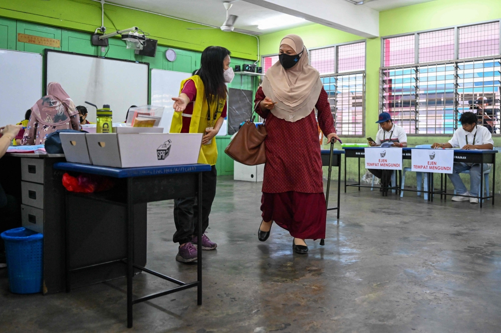 Malaysians vote in six state elections seen as referendum on Anwar ...